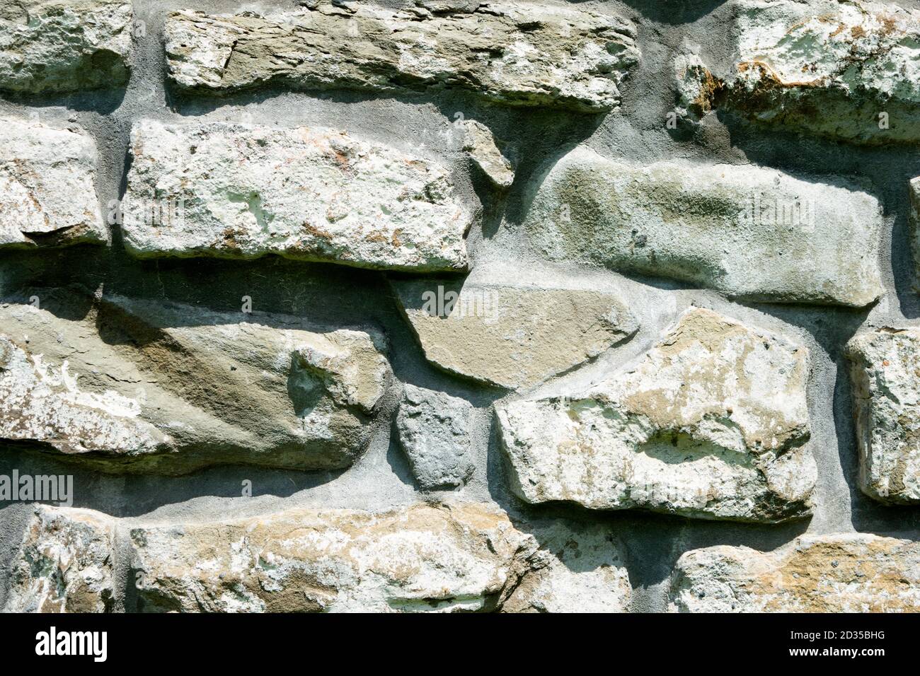 texture of masonry, the fragment of a stone wall of an ancient temple ...