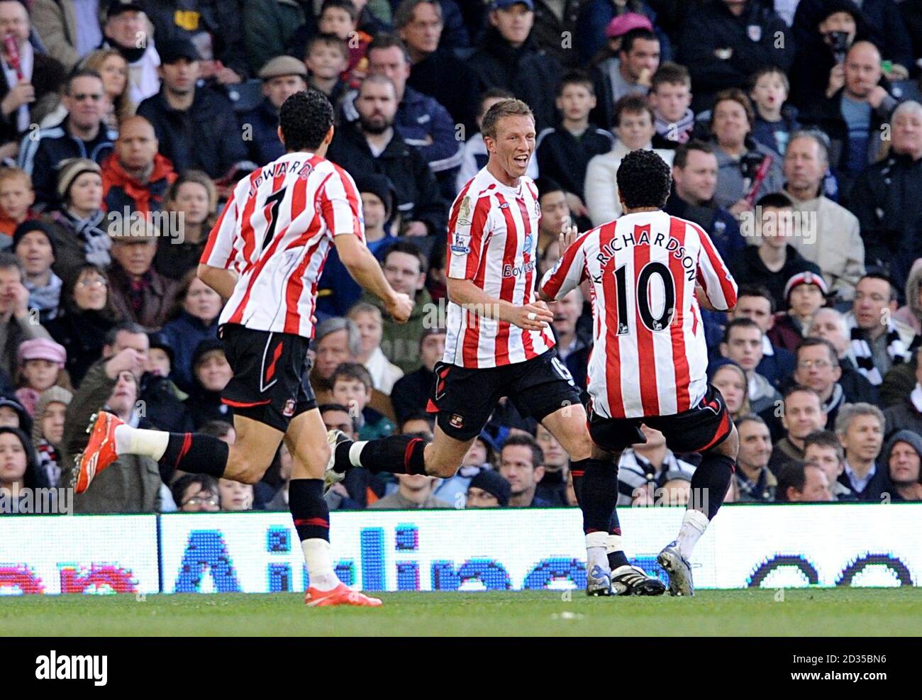 Sunderland's Danny Collins (centre) celebrates scoring the opening goal ...