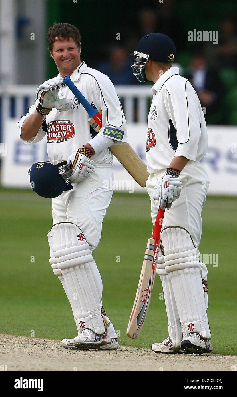 Kent's Rob Key (left) celebrates his century with James Tredwell during ...