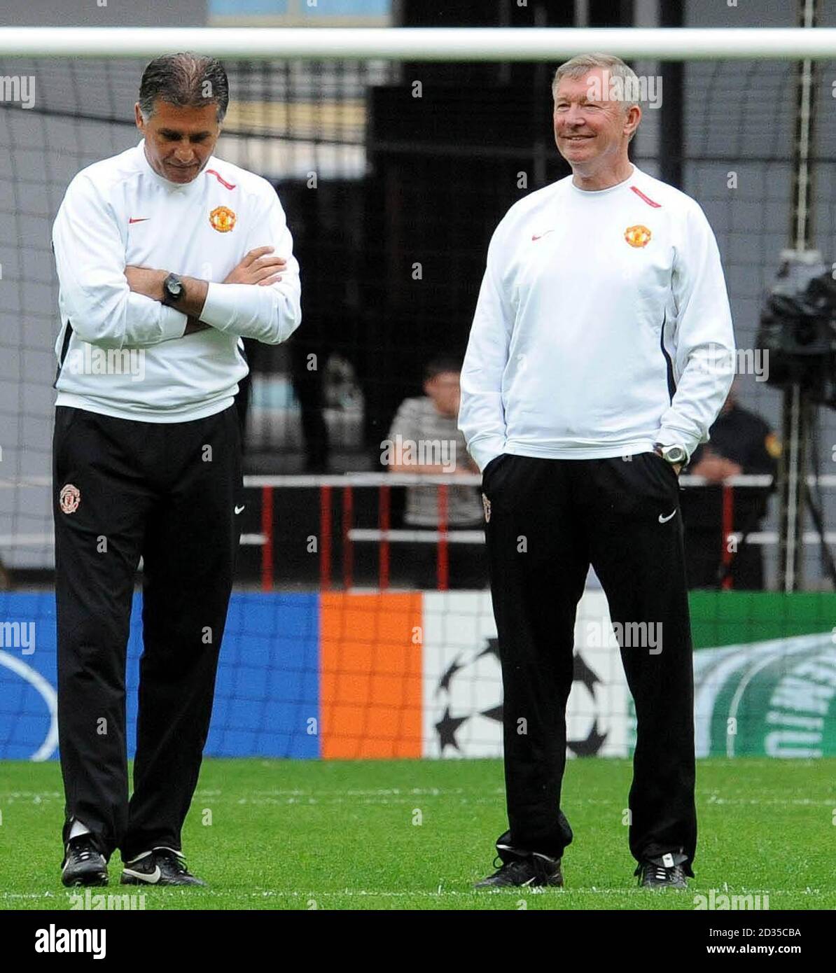 Manchester United's manager Alex Ferguson with assistant Carlos Queiroz ...