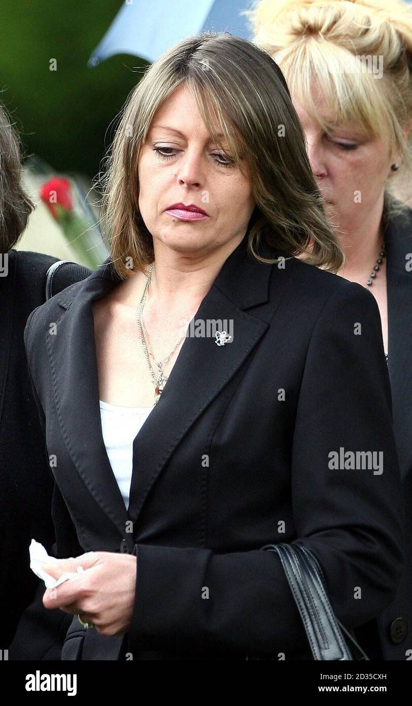 Lyn Philcox (centre) attends the funeral of her children, Amy and Owen ...