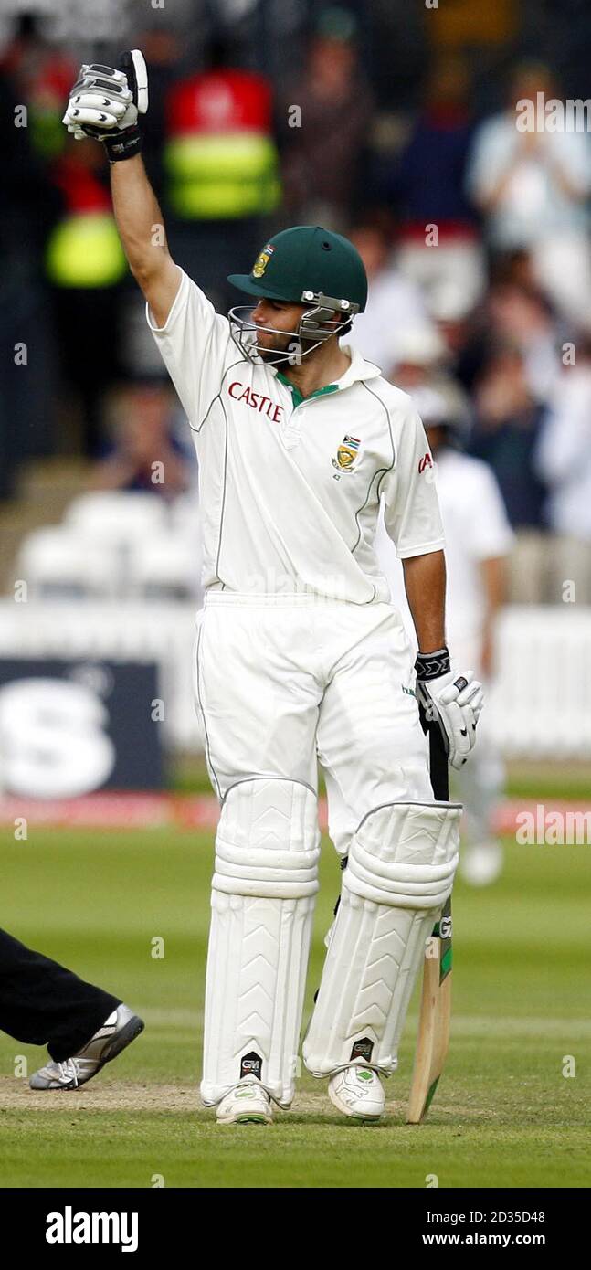 South African batsman Neil McKenzie walks off at the end of days play ...