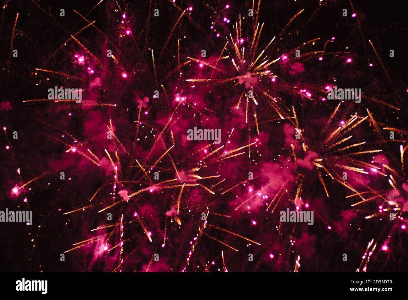 Beautiful, red fireworks display against a night sky Stock Photo - Alamy