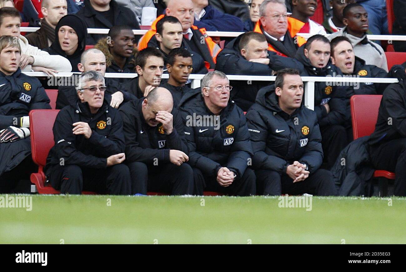 Manchester United manager Alex Ferguson with assistant manager Mike ...