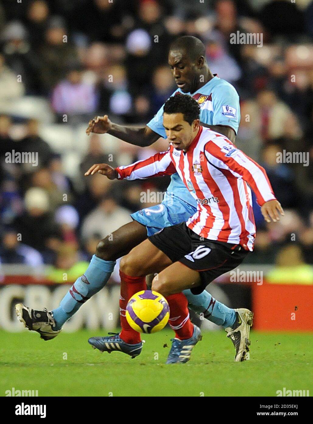 West Ham United's Carlton Cole (top) and Sunderland's Kieran Richardson ...