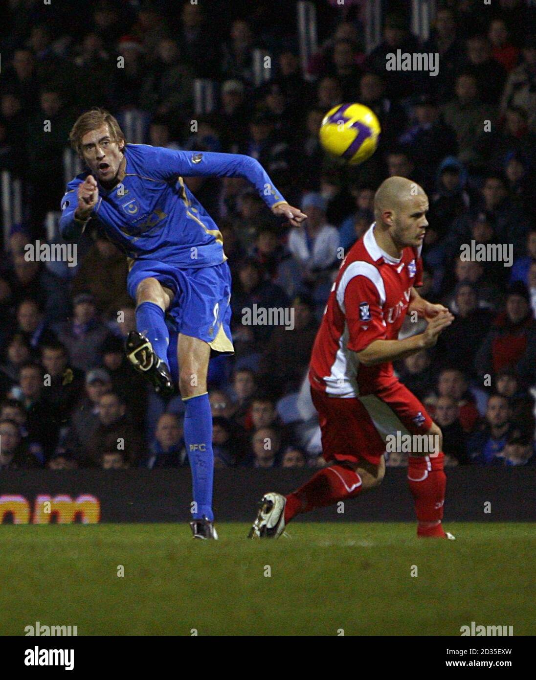 Portsmouth's Peter Crouch takes a shot in goal Stock Photo - Alamy