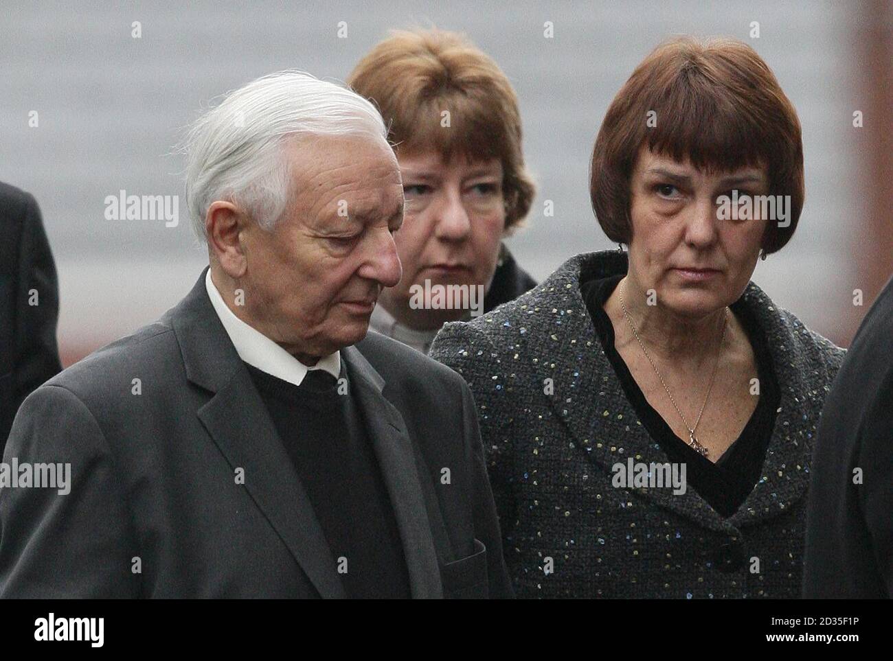 ALTERNATE CROP. John Staff arrives with family members for the funeral ...
