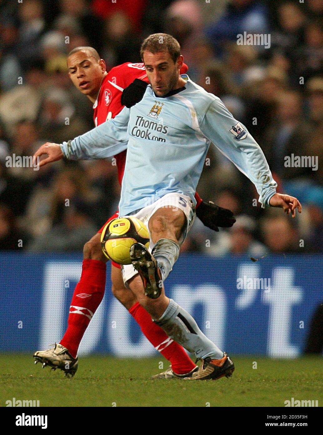 Manchester City's Pablo Zabaleta (r) and Nottingham Forest's Nathan ...