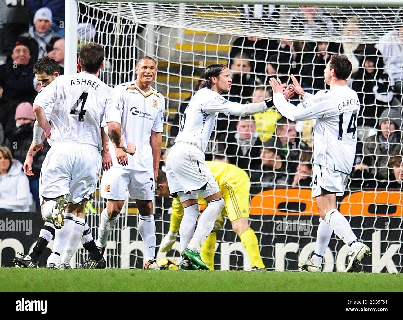 Hull City's Daniel Cousin (second left) celebrates with his team mates ...
