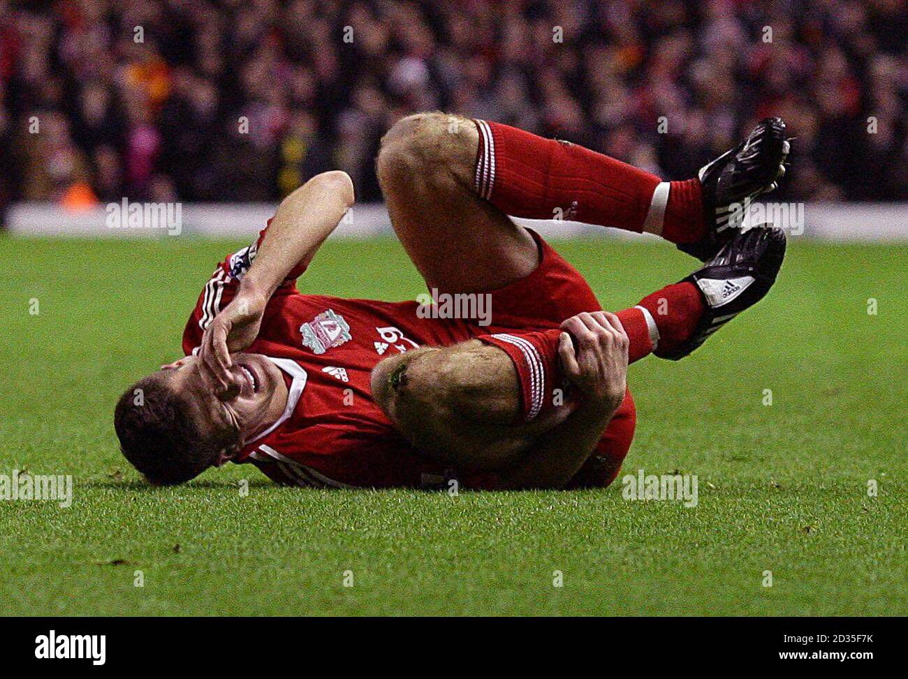 Footballer being fouled hi-res stock photography and images - Alamy