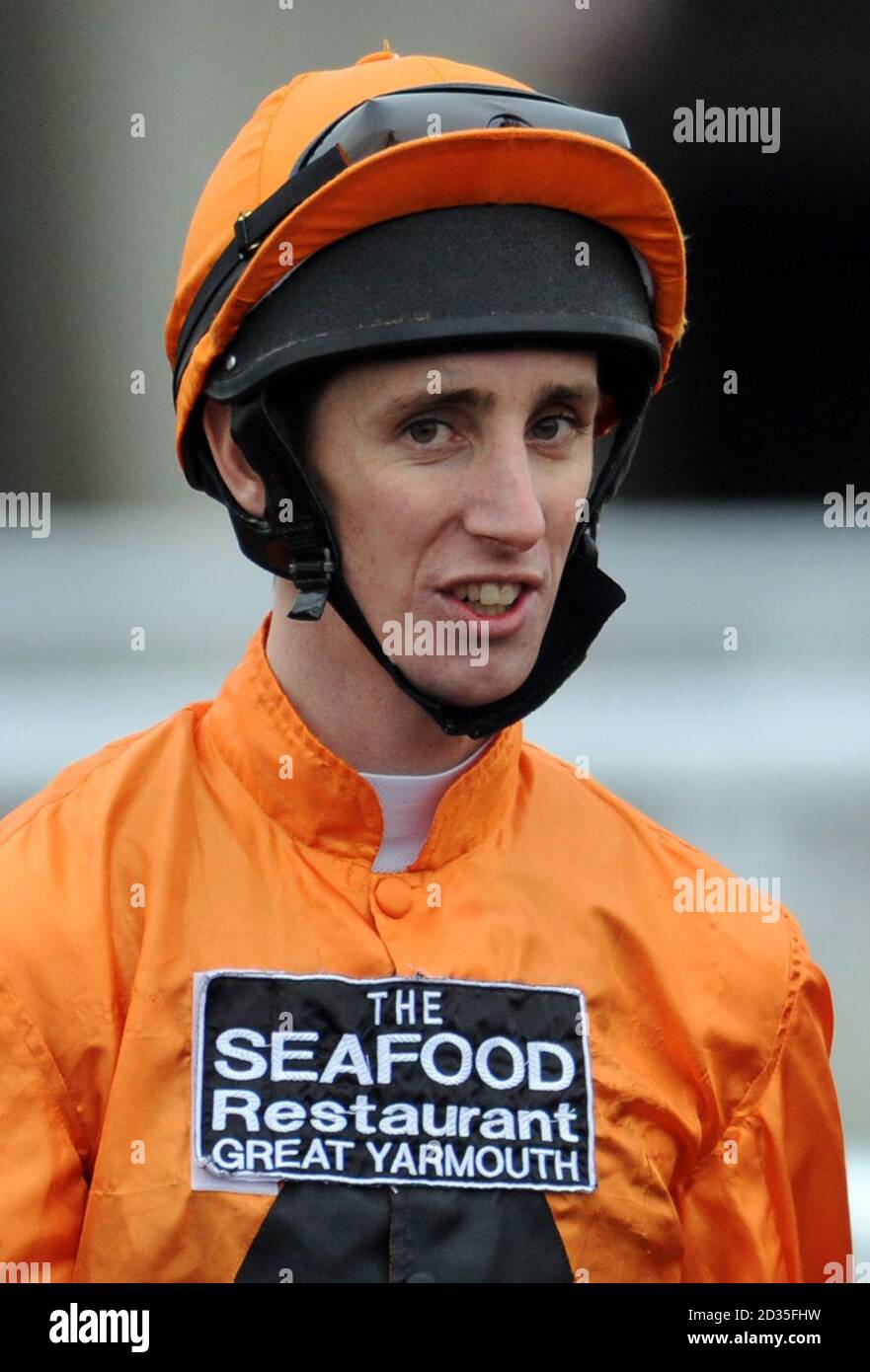 Jockey george baker at kempton park racecourse hi-res stock photography ...