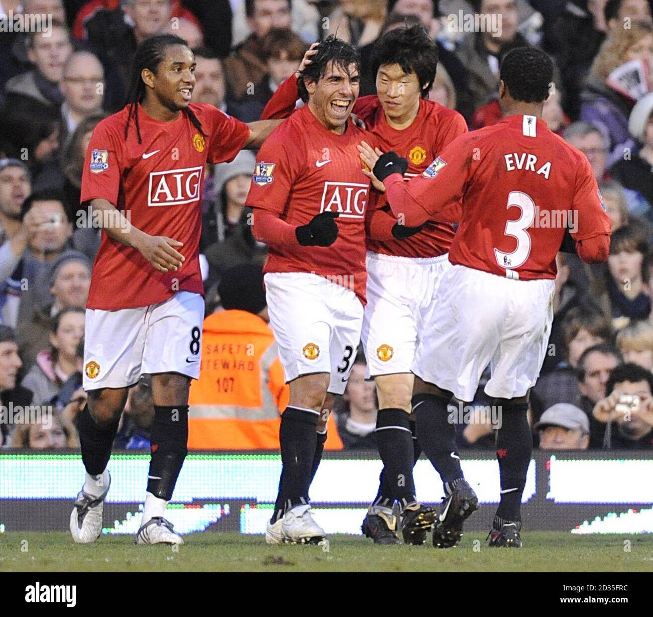 Manchester uniteds carlos tevez 2nd left celebrates hi-res stock ...