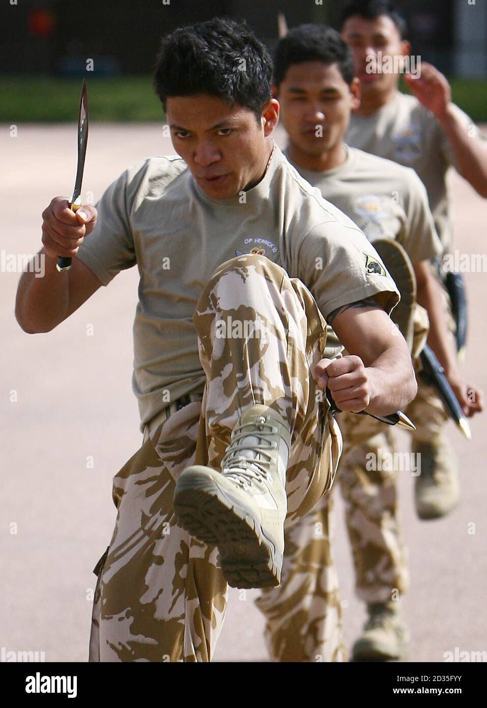 Members of Foxtrot Company of the 2nd Battalion the Royal Gurkha Rifles ...