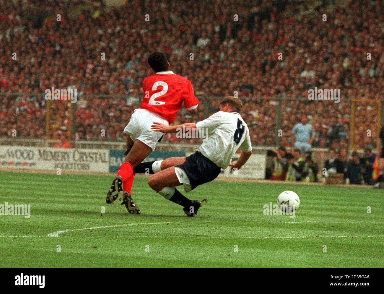 Tottenham Hotspur's Paul Gascoigne (r) hacks down Nottingham Forest's ...