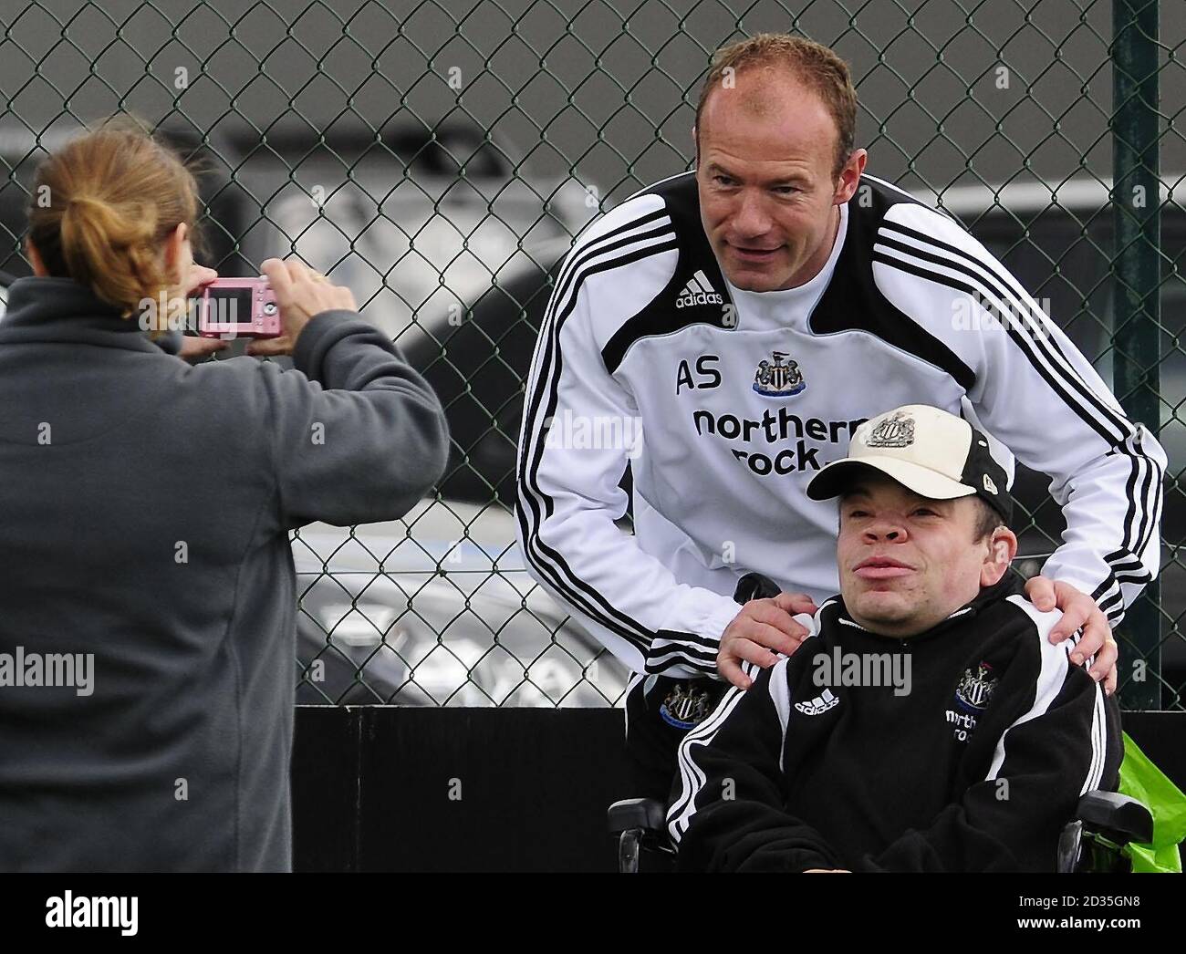 Newcastle United Manager Alan Shearer poses for a photograph with a fan ...