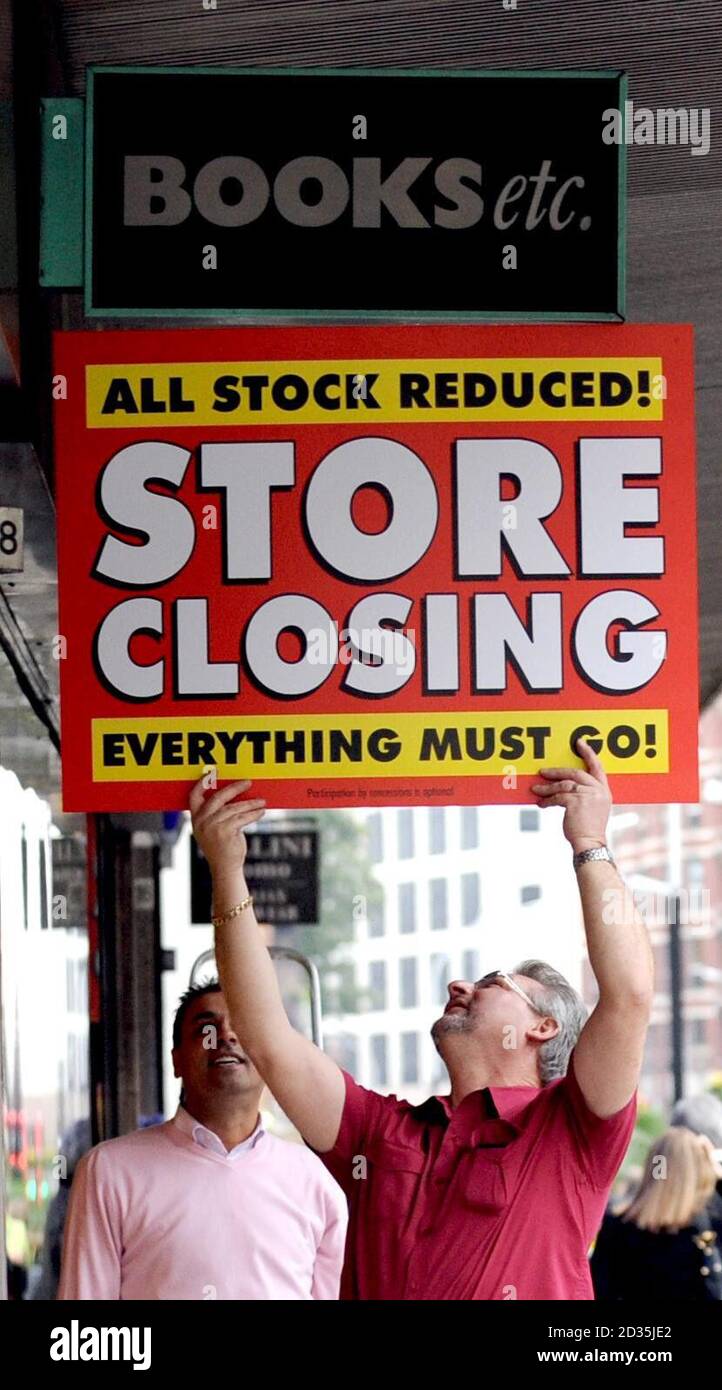 A store closing sign is hung outside a book shop on Victoria Street ...