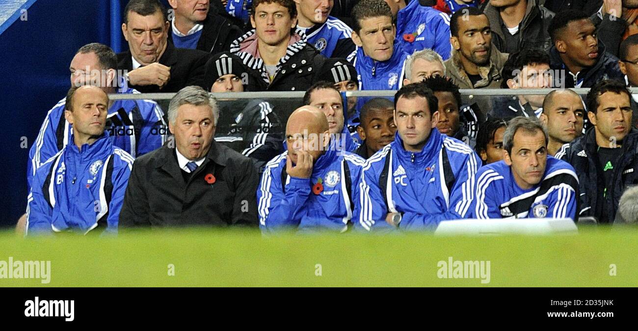 Chelsea manager Carlo Ancelotti (second left) watches the match from ...