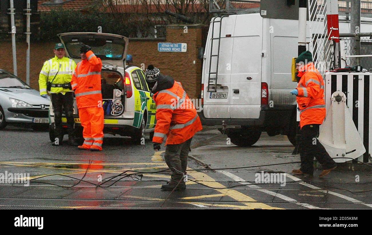 Engineers at the scene of a crash at the Merrion level crossing in ...