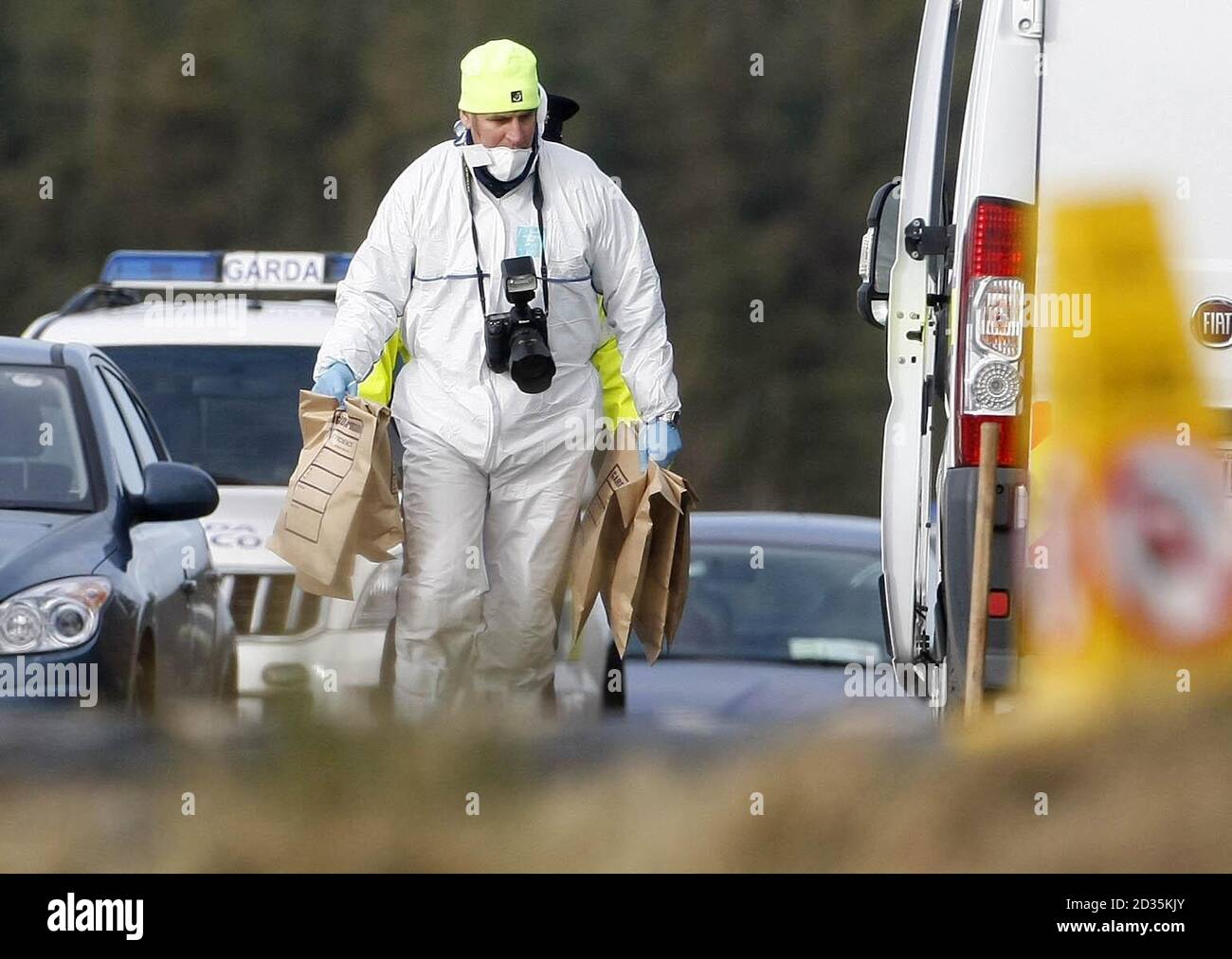 Gardai remove evidence hi-res stock photography and images - Alamy