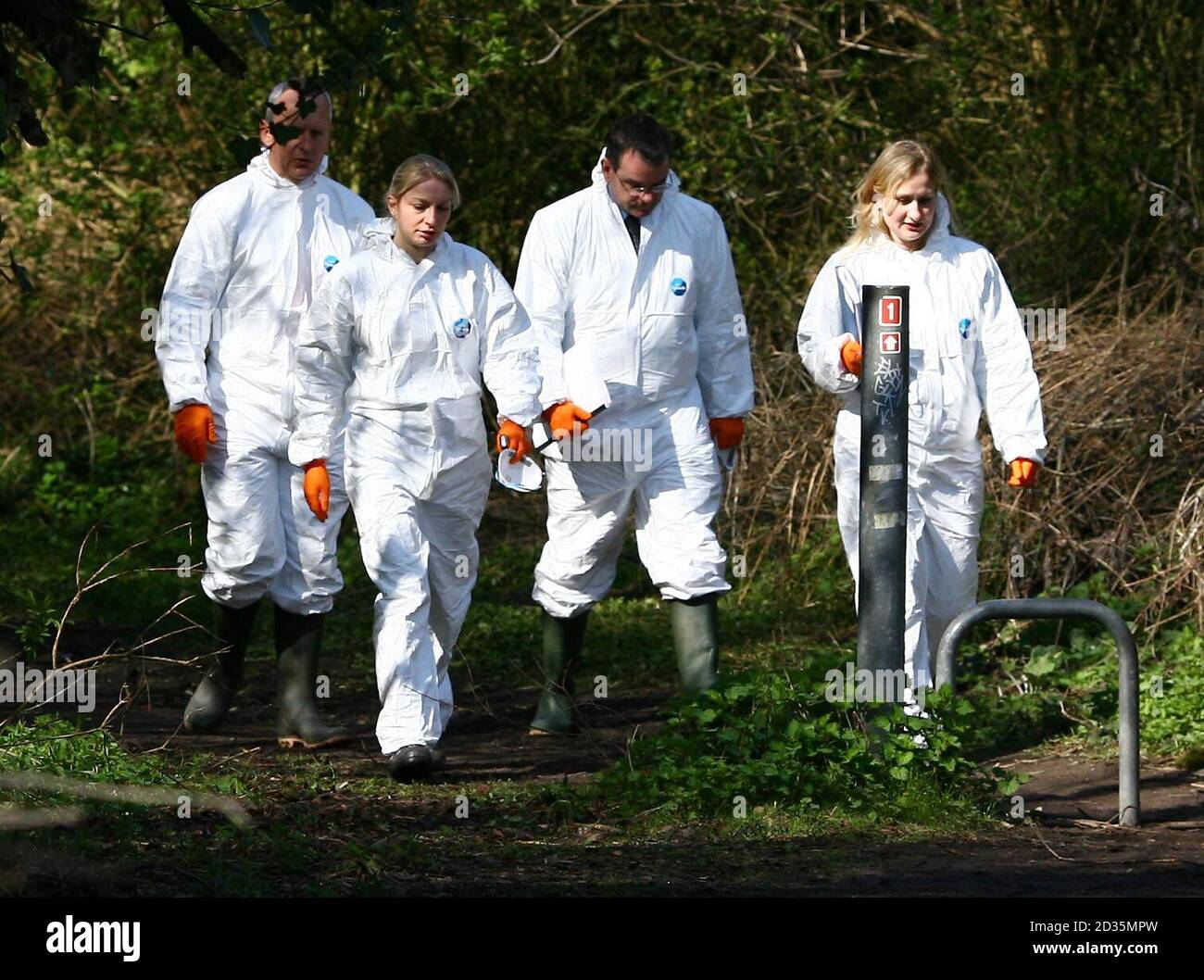 Police forensic officers investigate the scene in Higham, Kent, after ...