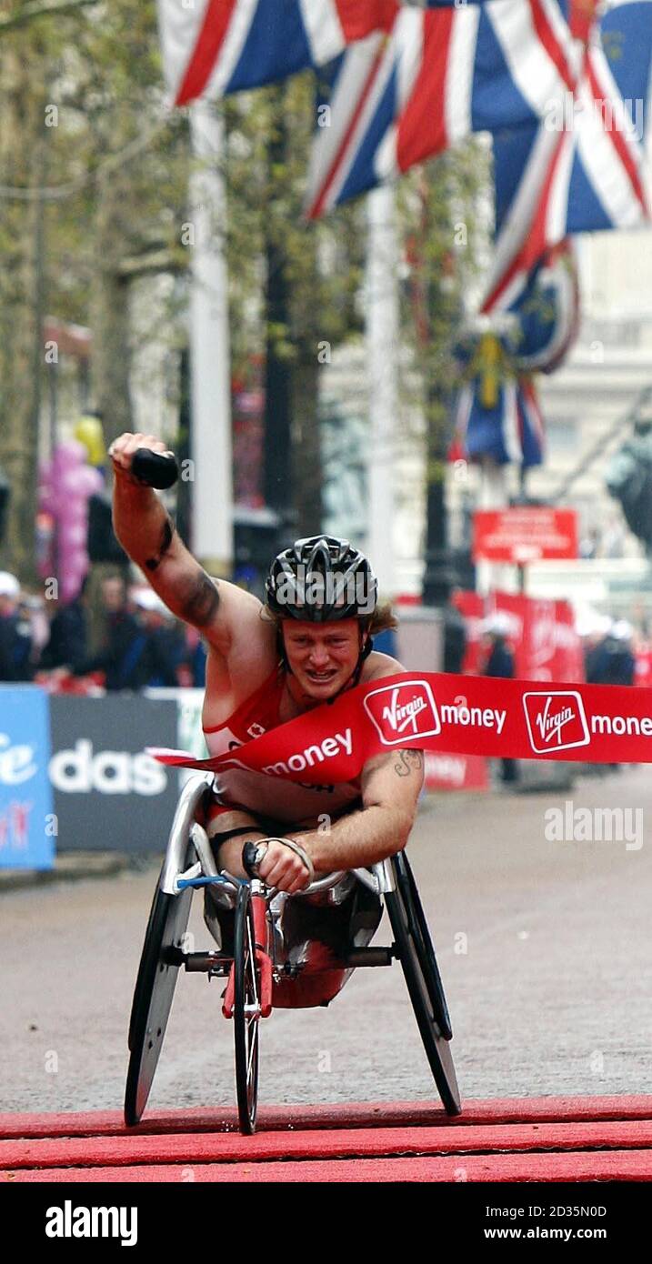 Canada's Josh Cassidy crosses the line to win the elite men's ...