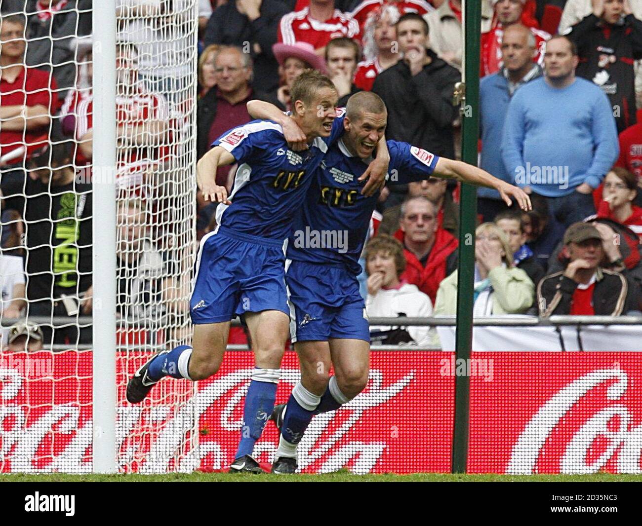 Millwall's Paul Robinson (left) celebrates with team mate Steve Morison ...