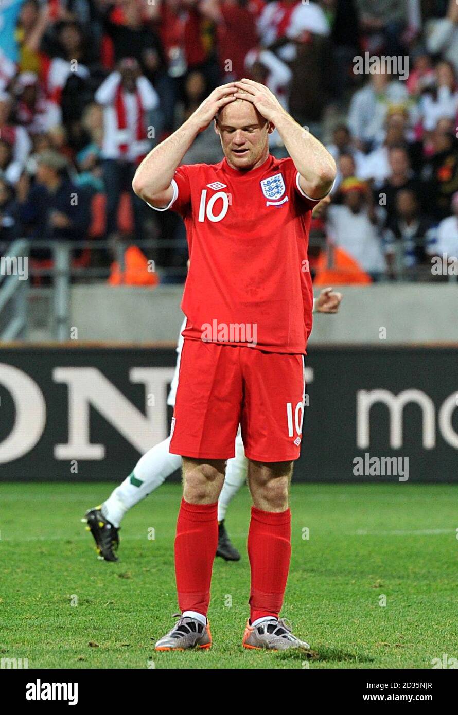 England's Wayne Rooney shows his frustration after his shot on goal ...