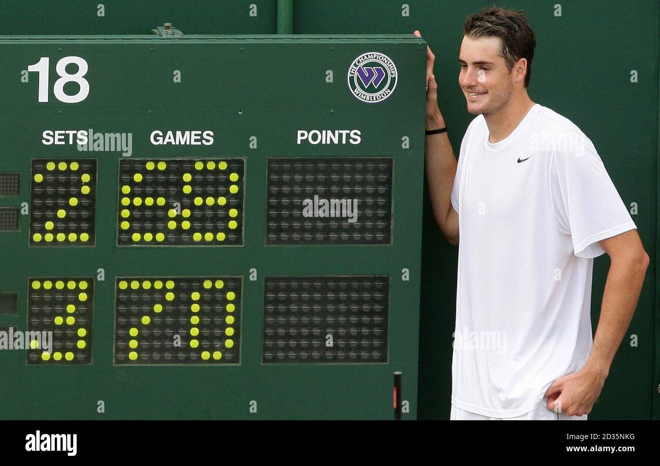 *ALTERNATE CROP* USA's John Isner stands next to the scorboard after ...
