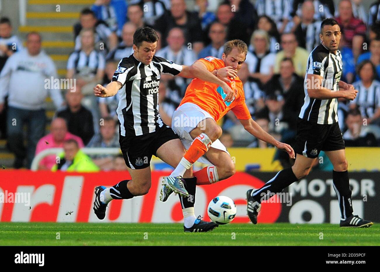 Newcastle United's Joey Barton (left) and Blackpool's Luke Varney ...