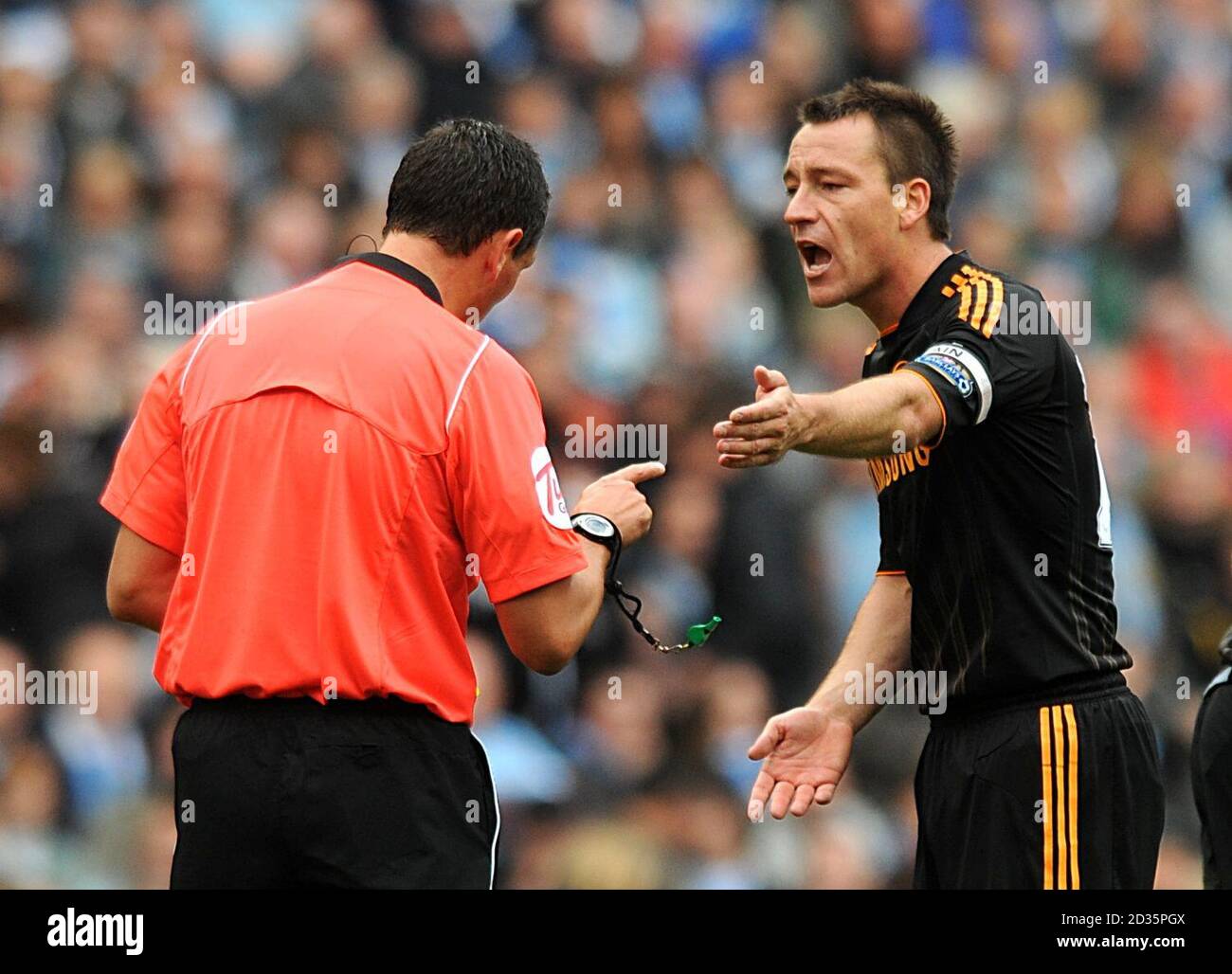 Chelsea's John Terry and referee Andre Marriner Stock Photo - Alamy