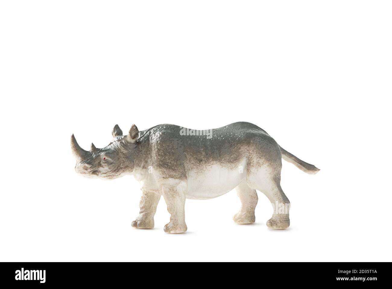 Rhino mini figure isolated on white background. Plastic animal toy ...
