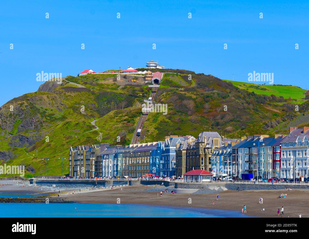 A view of the seafront buildings of Aberystwyth.Funicular railway takes ...