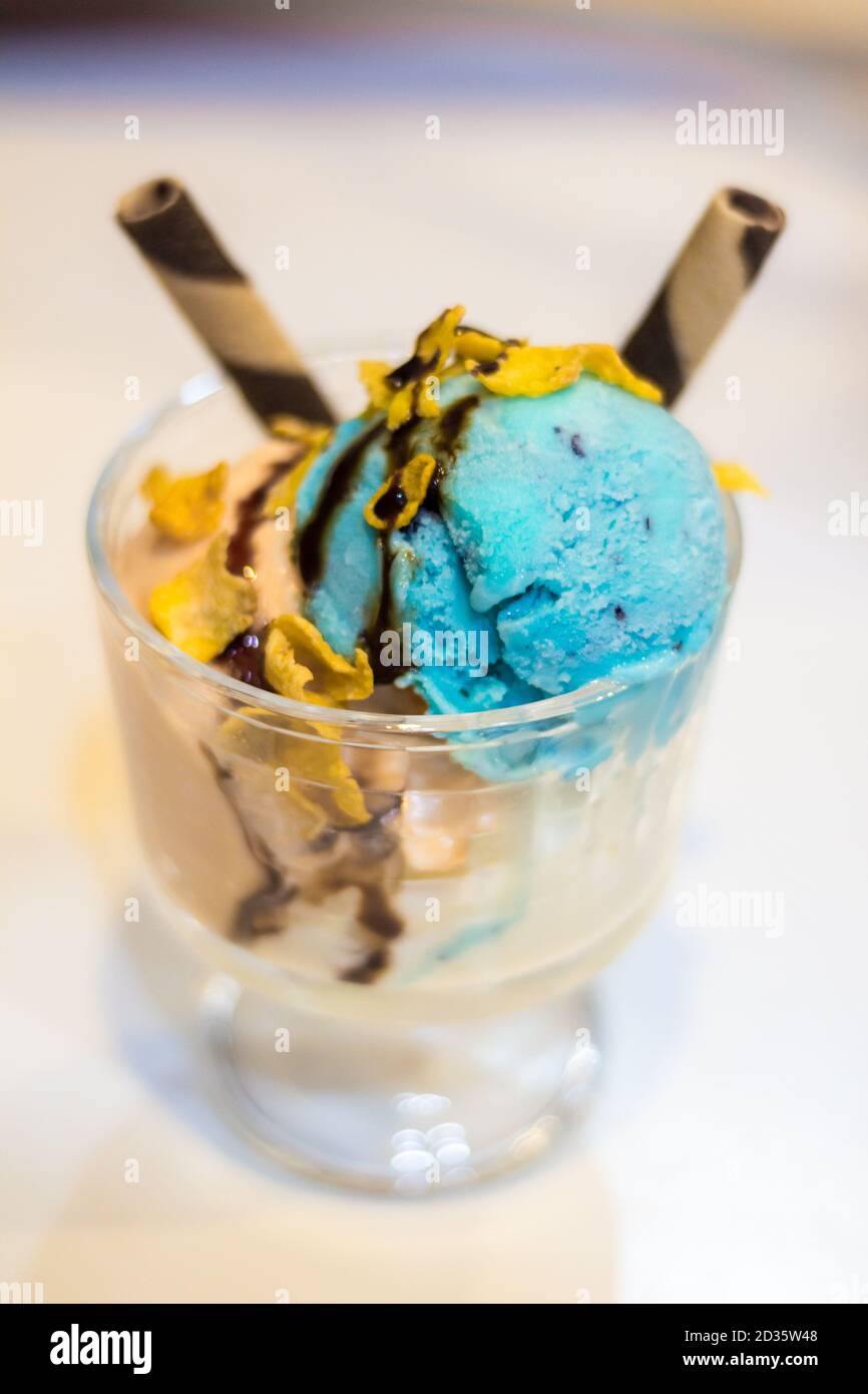 Ice cream sundae with wafer sticks Stock Photo - Alamy