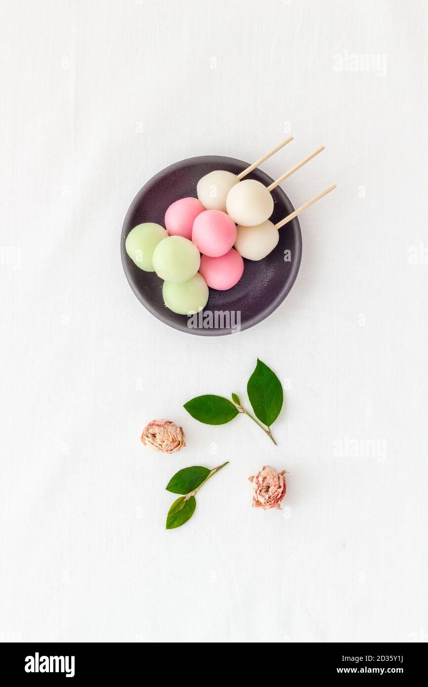 Japanese three colored dumplings Dango on plate, top view Stock Photo ...