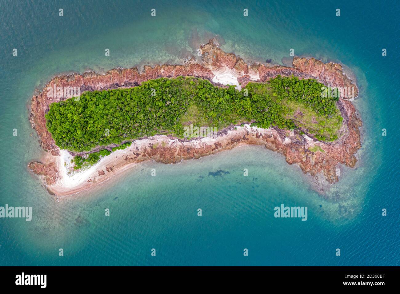 Aerial view of tiny rocky island in sea Stock Photo - Alamy