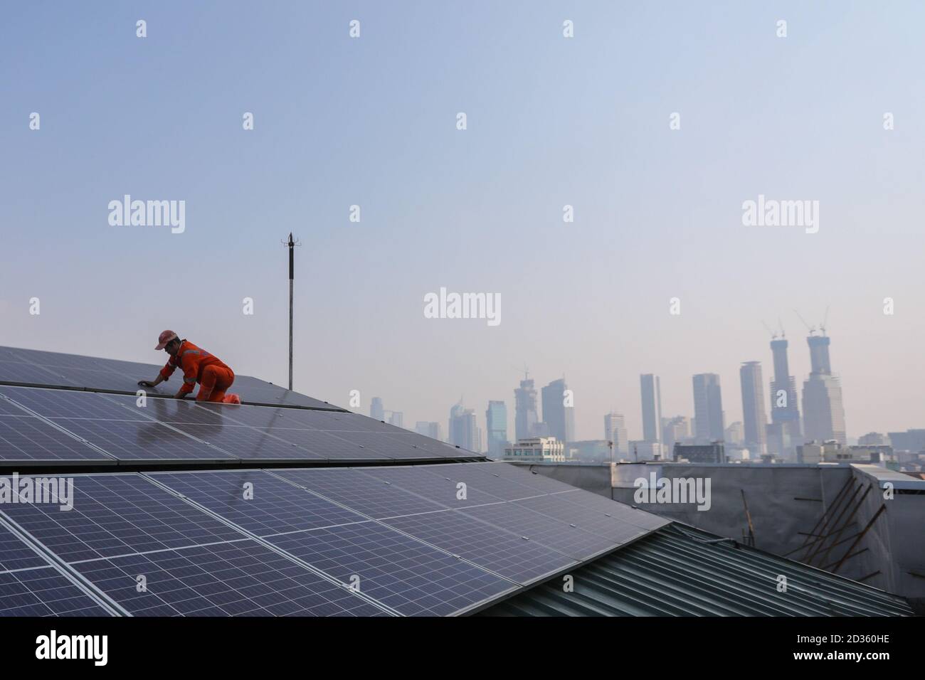 Officers carry out routine maintenance on solar panels at Building ...