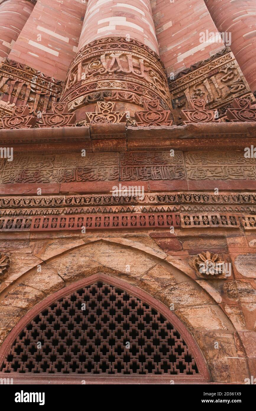DELHI, INDIA Tourists visiting Qutub Minar, tallest minaret. Tower made ...