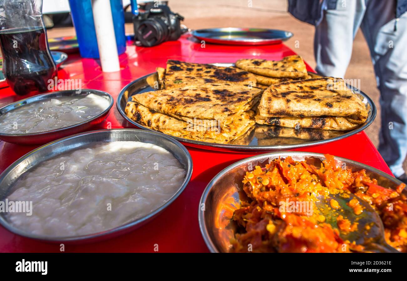 Tasty Indian breakfast, Parathas with curd and tea, Indian Breakfast ...