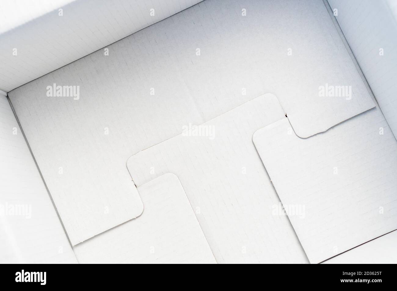 White cardboard packing box from the inside close up. Delivery concept ...