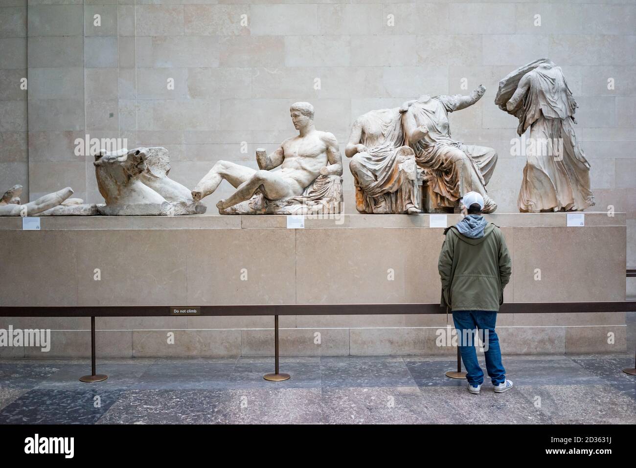 Tourist visiting The East Pediment of Parthenon. United Kingdom, London ...