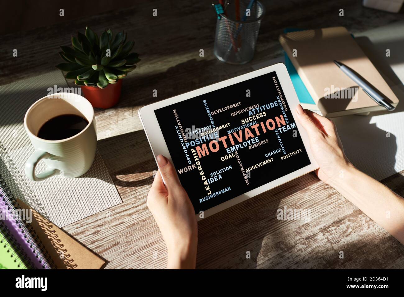 Motivation words cloud on the device screen Stock Photo - Alamy