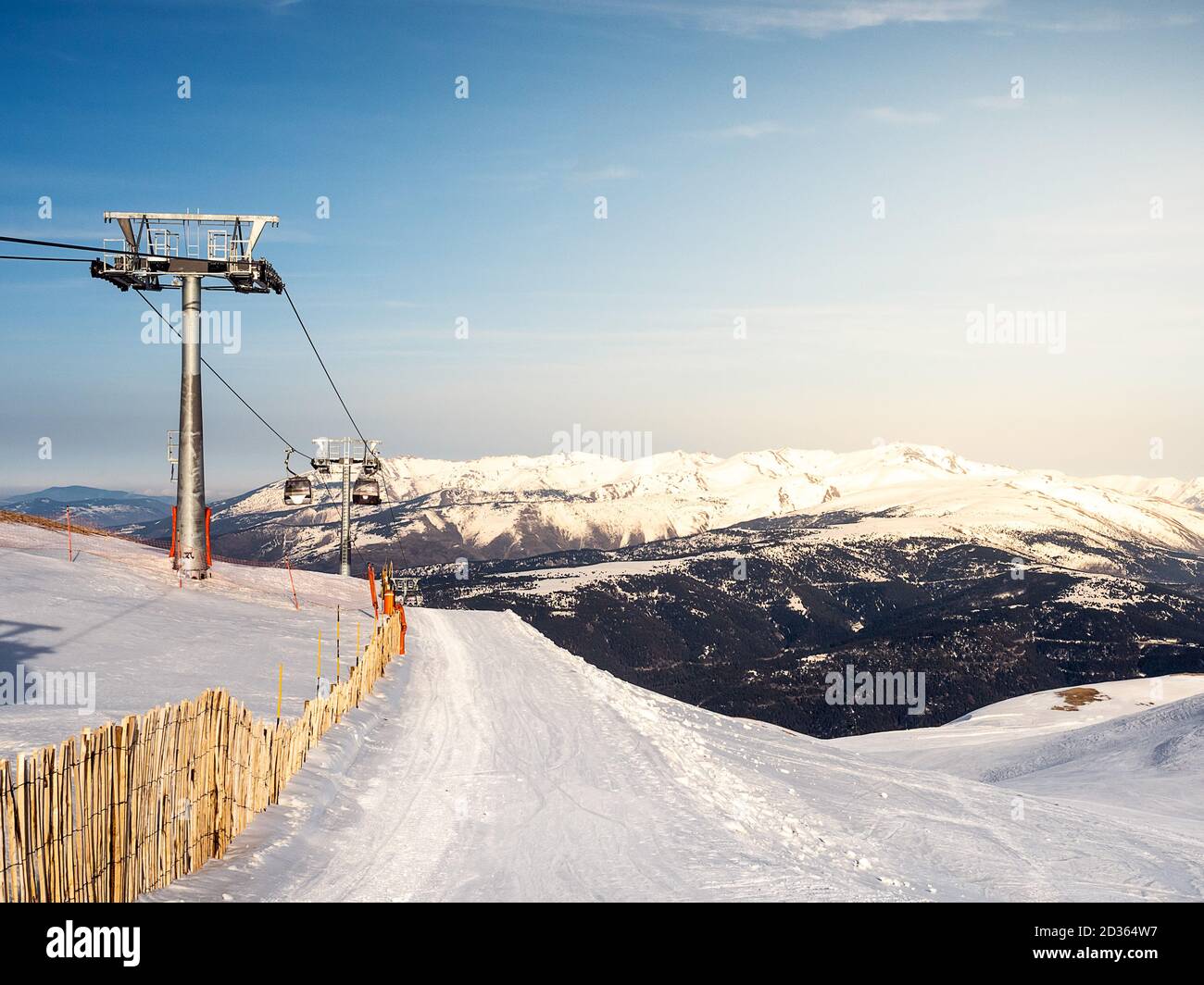 ski elevator at the top of a snowy mountain, concept of winter sports ...