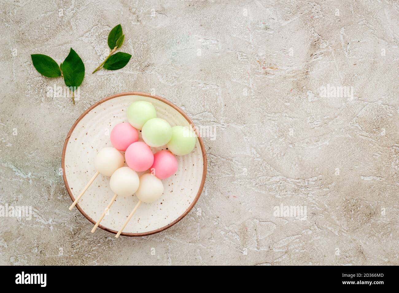 Japanese three colored dumplings Dango on plate, top view Stock Photo ...
