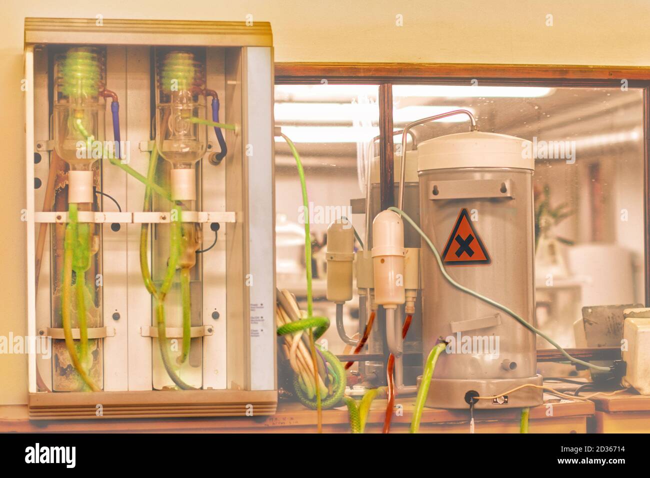 Futuristic background of real lab with poisonous green liquid ...