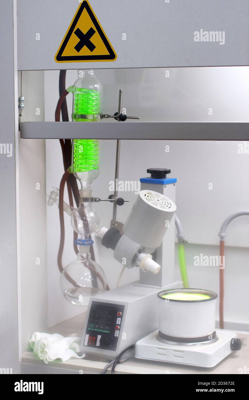 Futuristic background of real lab with poisonous green liquid ...