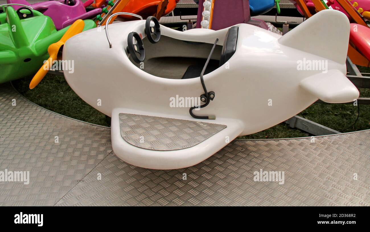 A Childrens Aeroplane Fun Fair Amusement Ride Stock Photo - Alamy