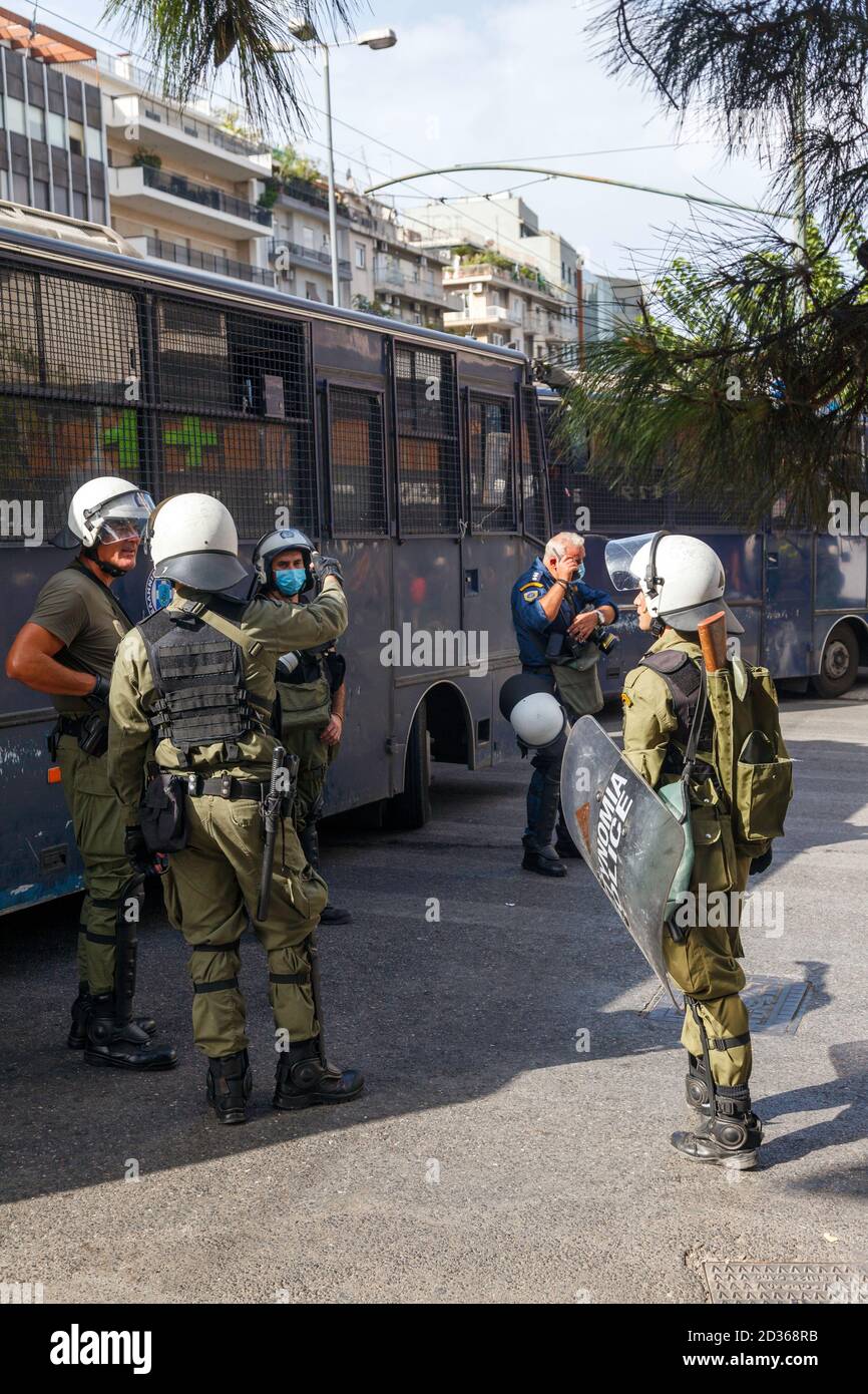 Police officers of Greek Police Force are on alert during a protest ...