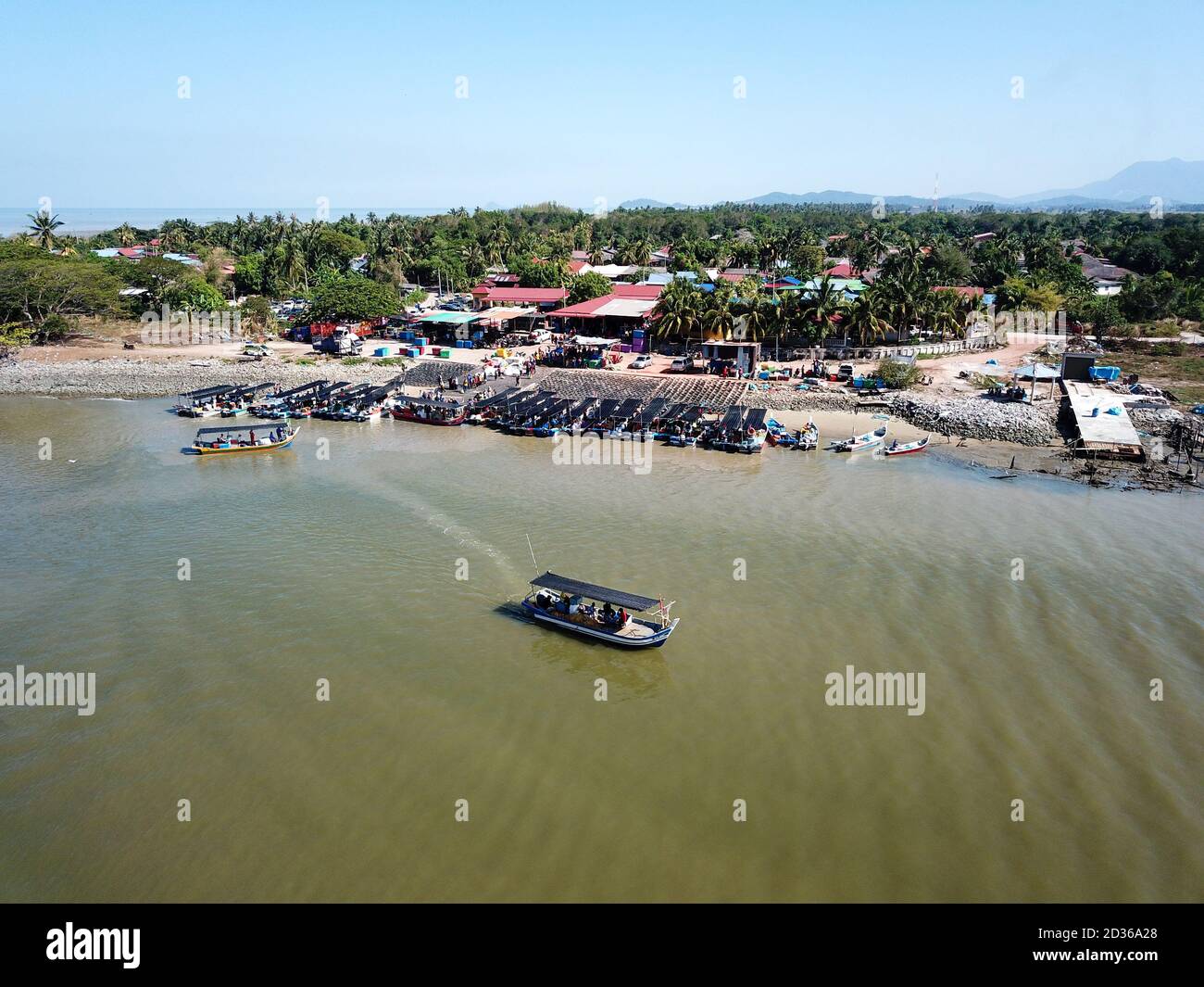 Fishing boat leave pasar bisik-bisik Stock Photo - Alamy