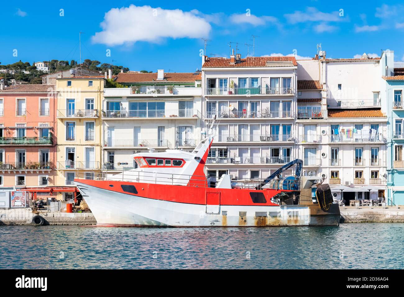 Sète in France, fisherboat at the quay, typical colorful facades Stock ...