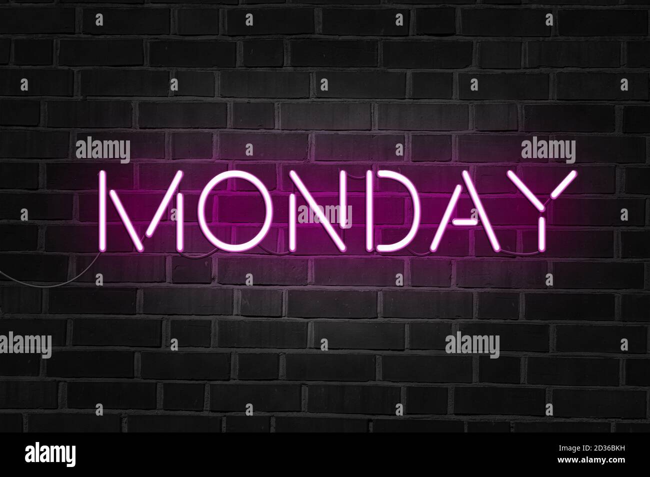 Monday purple neon sign on brick wall Stock Photo - Alamy